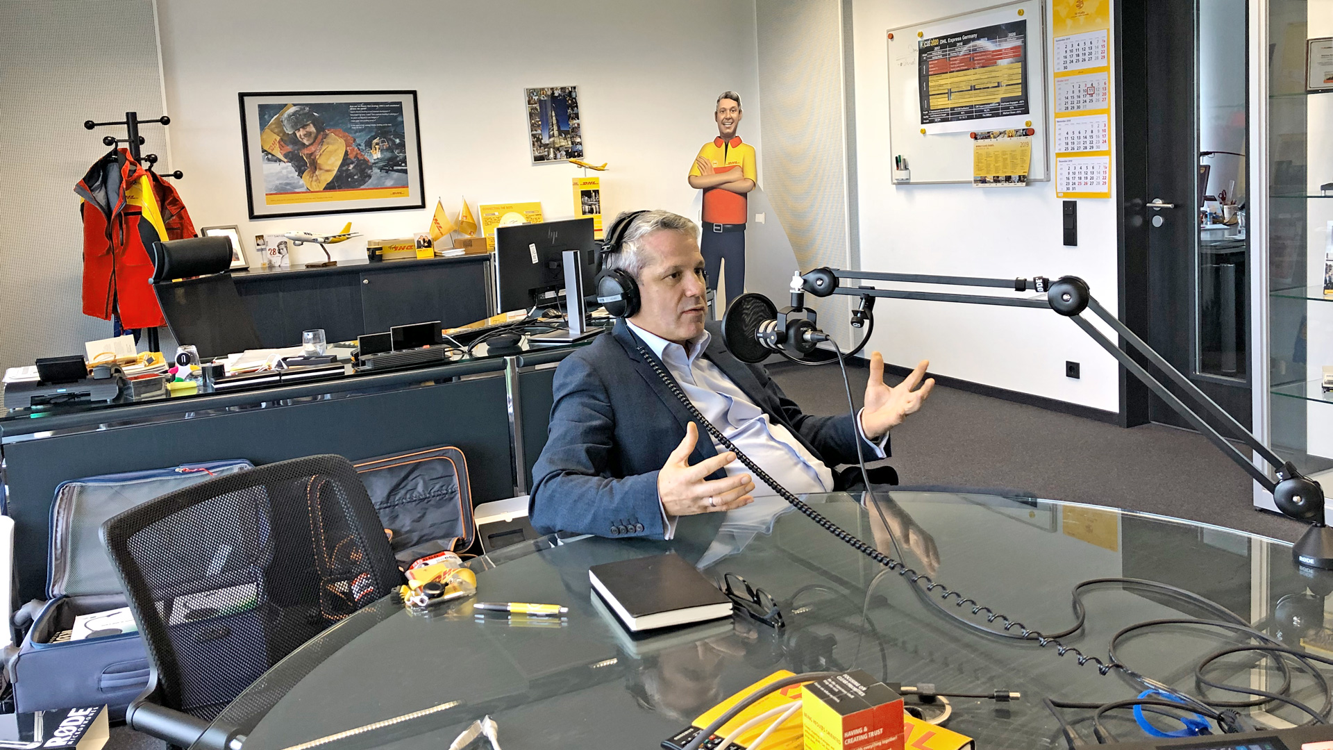 DVZ Podcast: Wie aus der Liebe zum Wellenreiten DHL Express wurde - DVZ